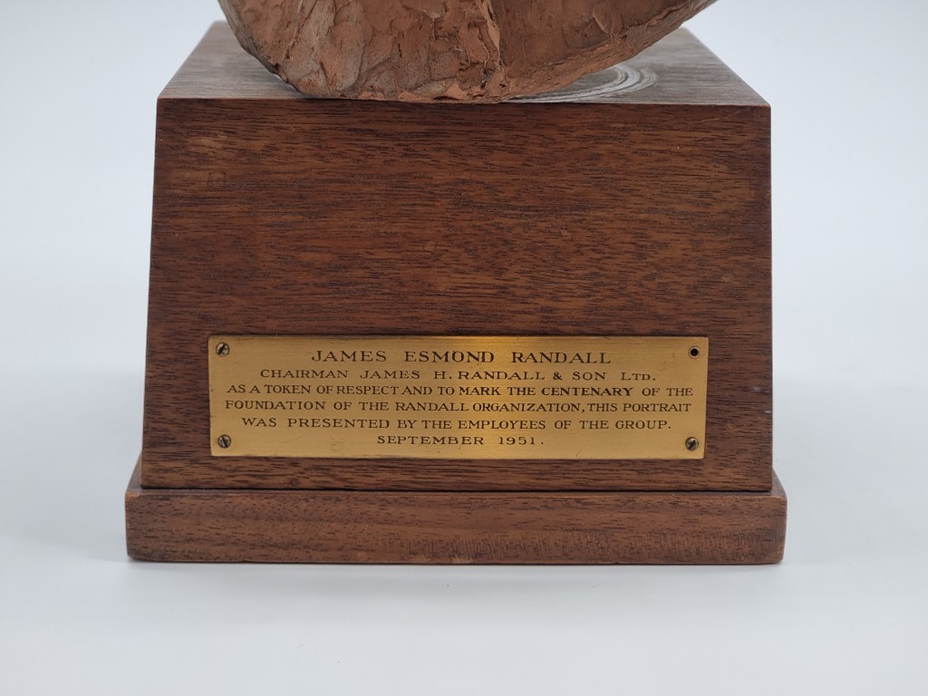 Freda Skinner, a terracotta bust of James Esmond Randall, signed and ...