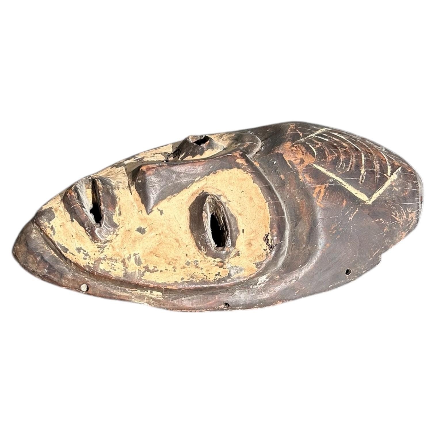 CONGO, BEMBE AFRICAN TRIBAL MASKHaving carved diamond scarification ...