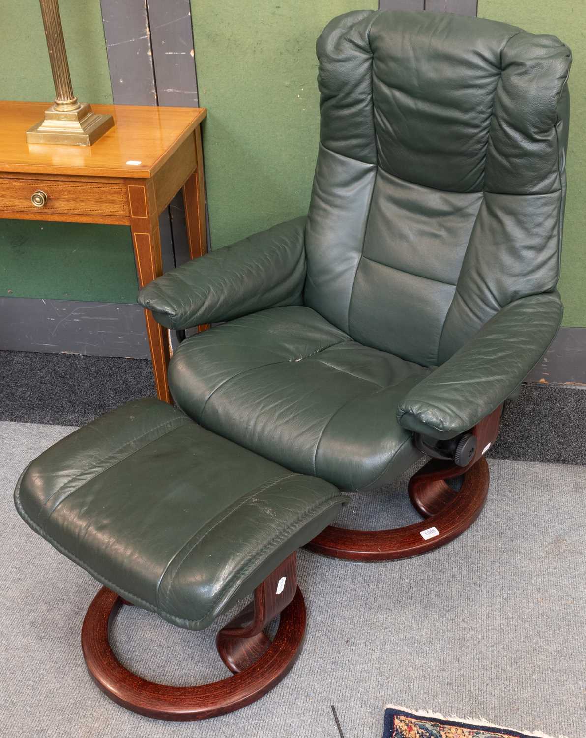A Pair of Ekornes Green Leather "Stressless" Reclining Chairs; together ...