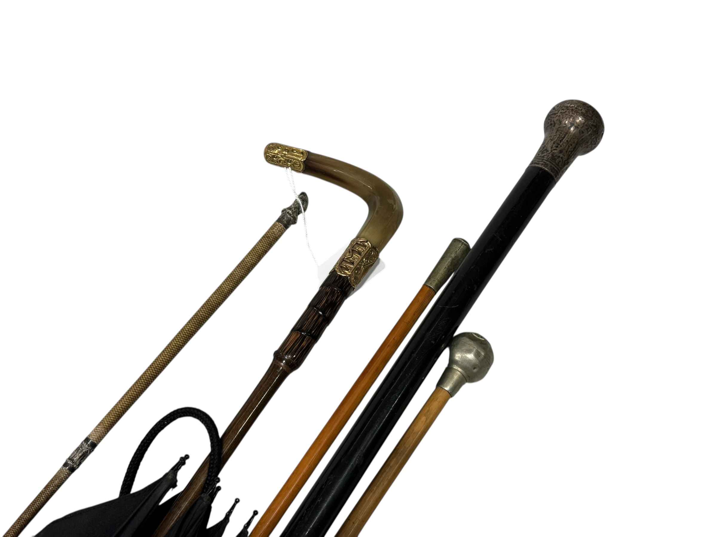 Silver topped cane, swagger stick, crop etc.