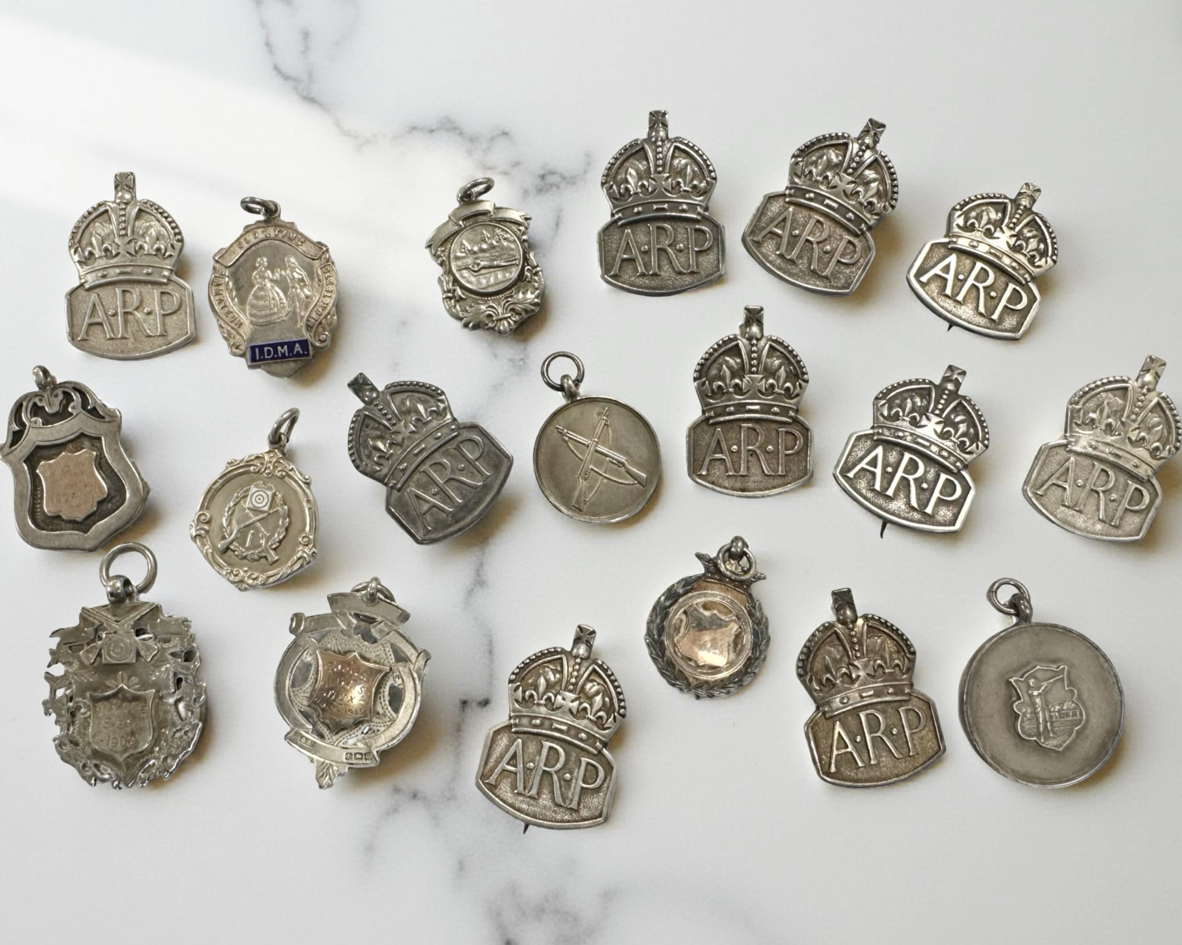A large quantity of silver medallions, ARP badges etc. CONDITION REPORT ...