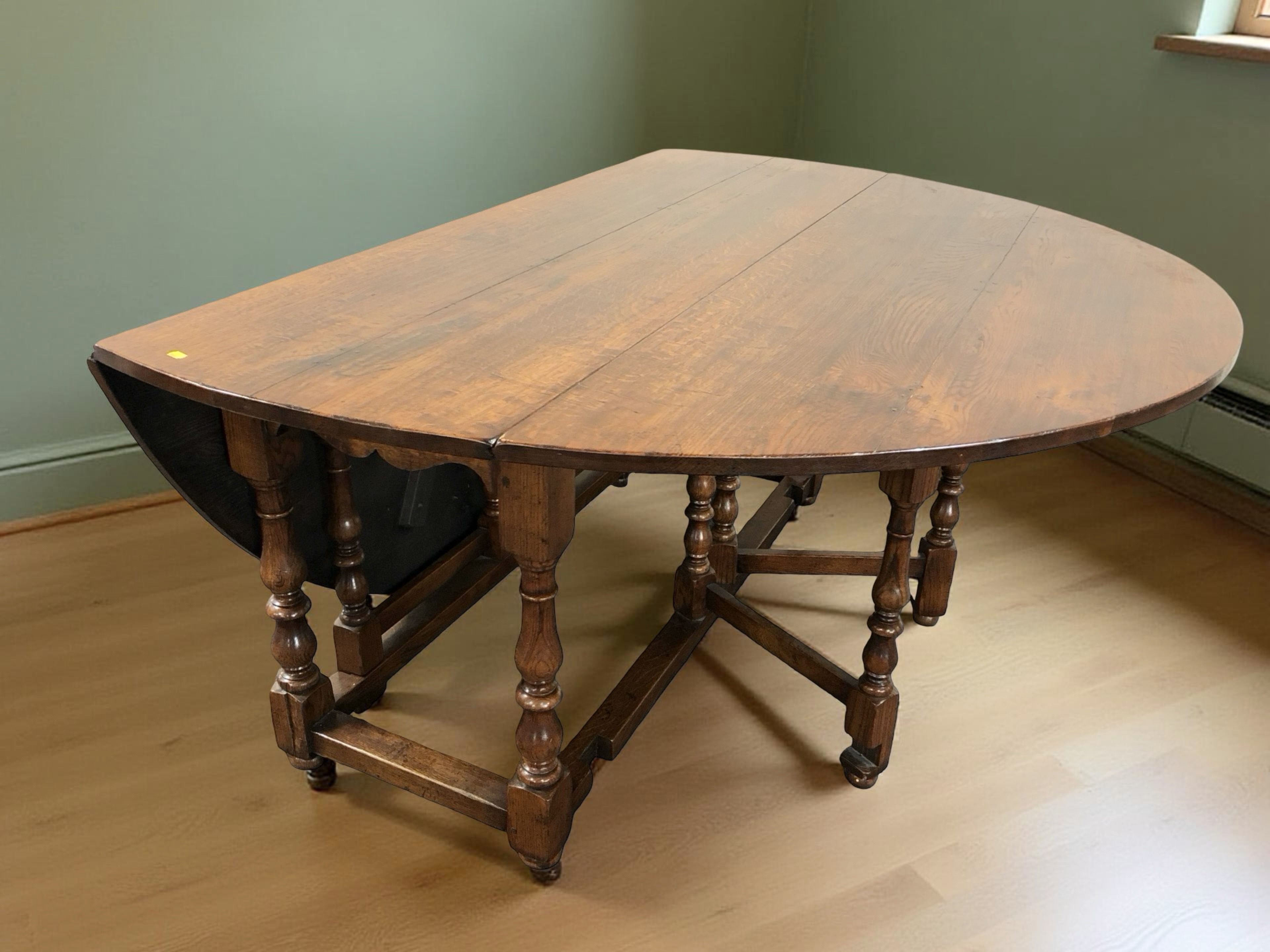 A reproduction oak drop leaf gate leg farmhouse dining table in the ...