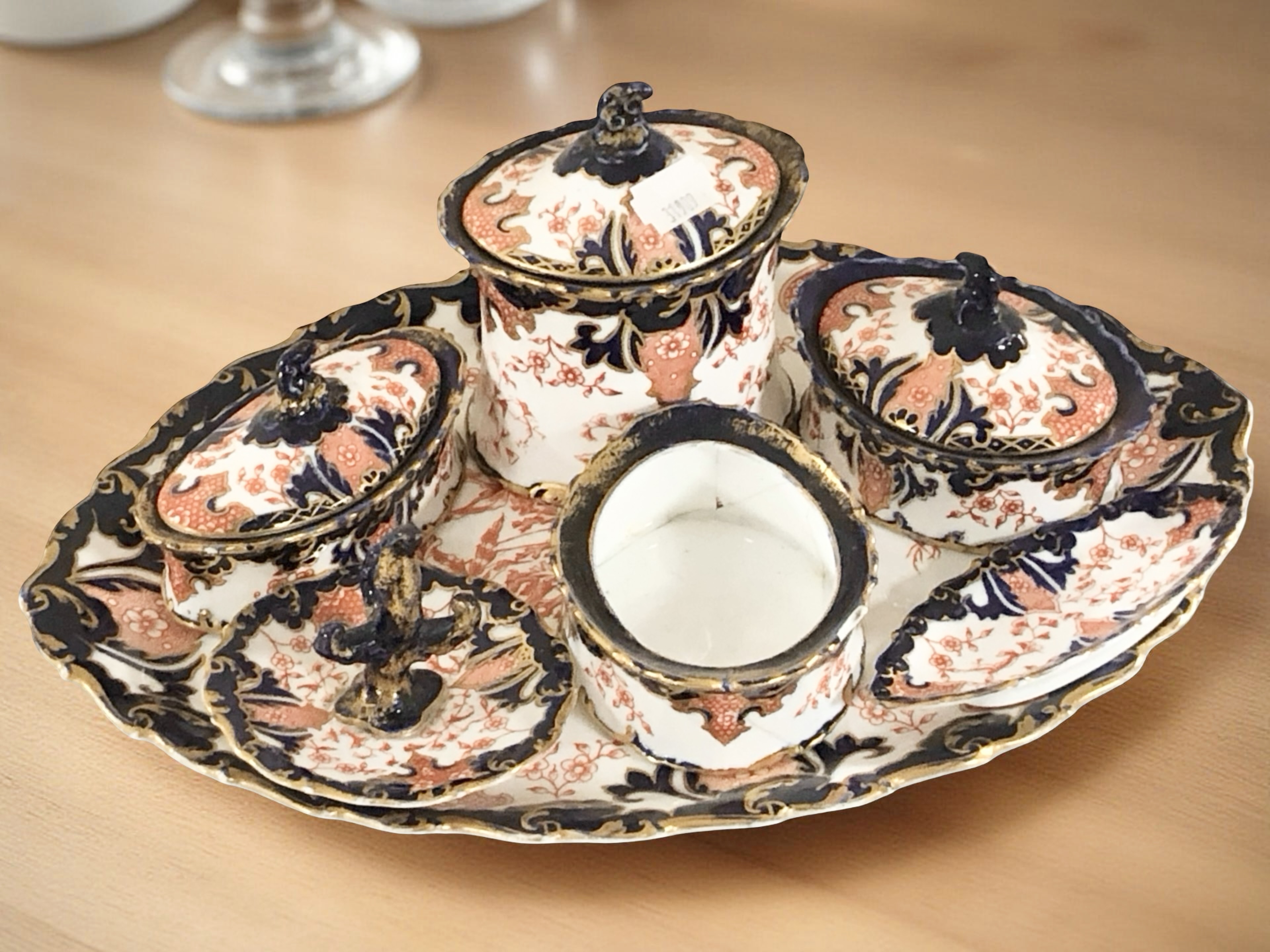A 19th century Royal Crown Derby oval dressing table tray and several ...
