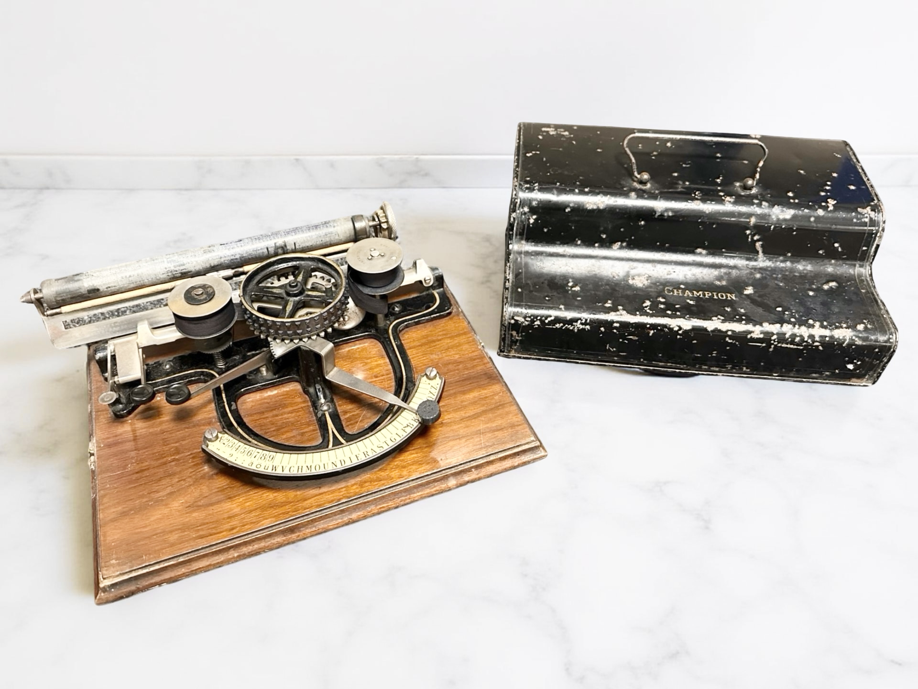 An American Champion typewriter, circa 1890s, serial No. 8925.