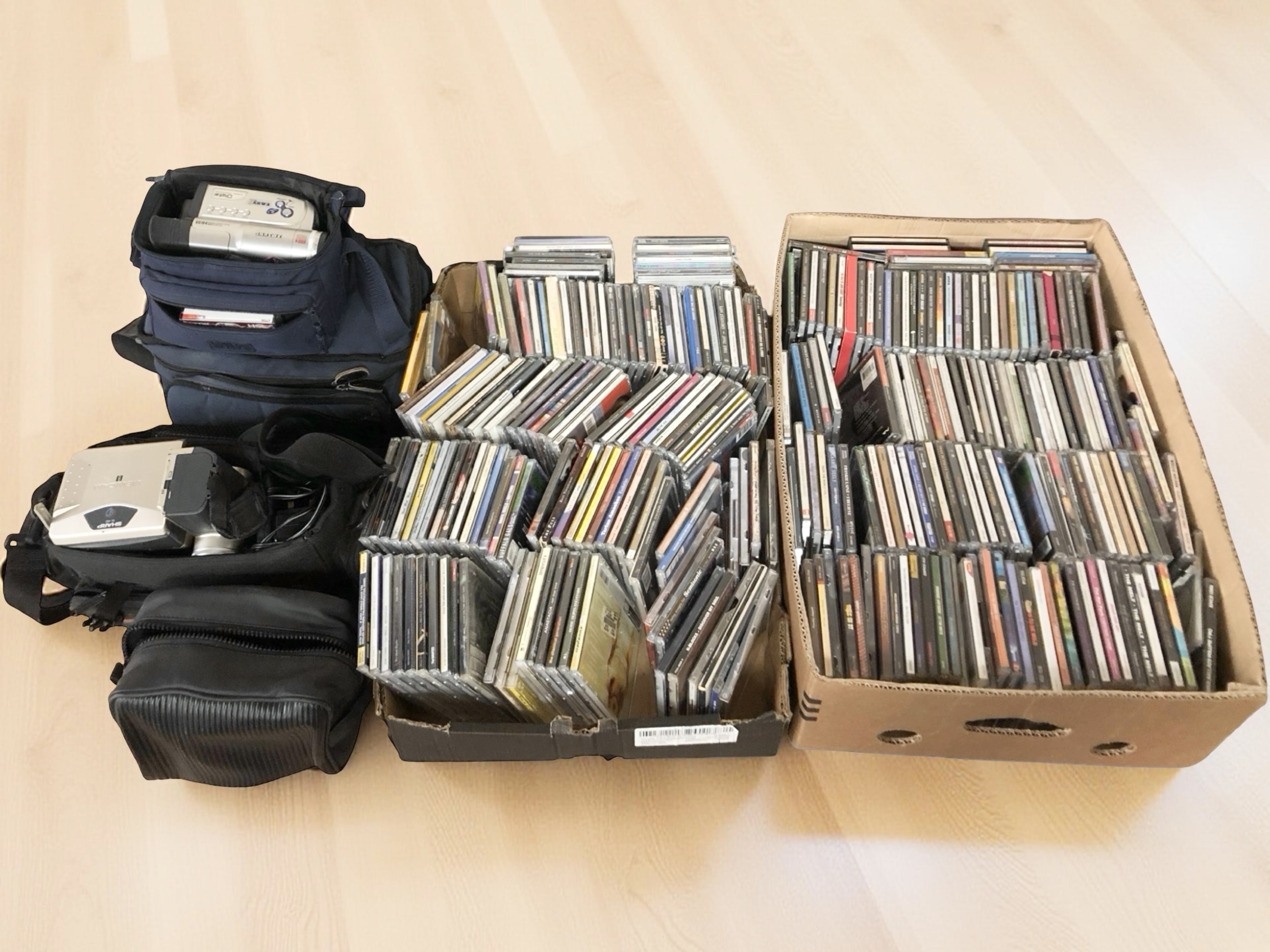 A large quantity of CDs, together with a Samsung video camera, etc. (3 ...