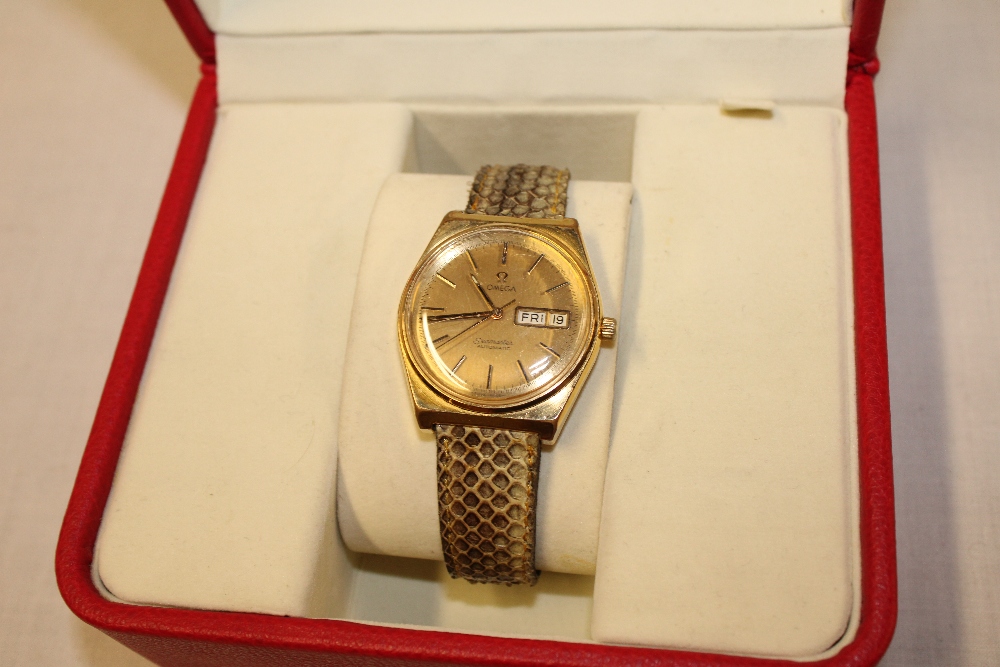 A gentlemans Omega Seamaster automatic wristwatch in gold-plated case ...