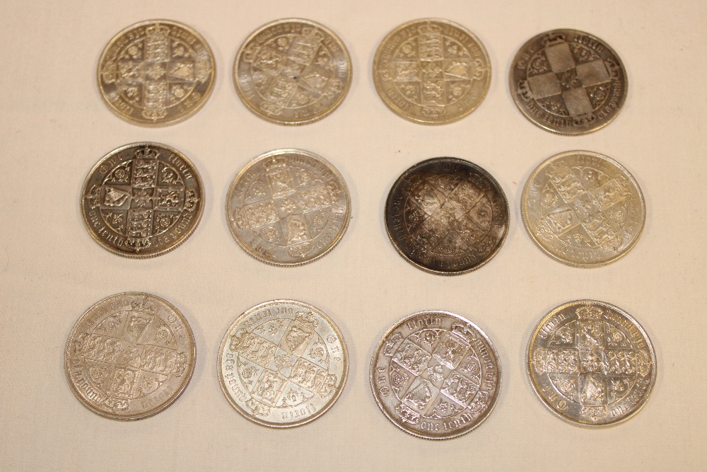 A collection of twelve Victorian silver gothic florins including 1873 ...