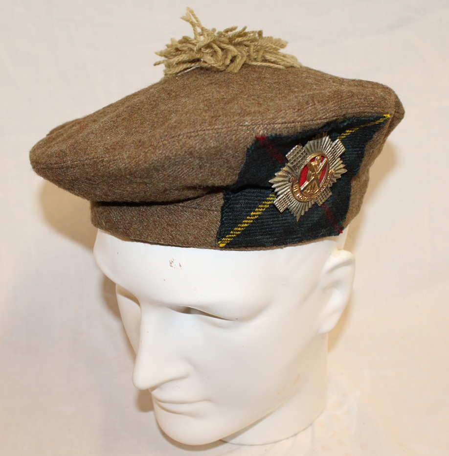 A Second War khaki Royal Scots "Tam O'Shanter" beret, date coded 1943