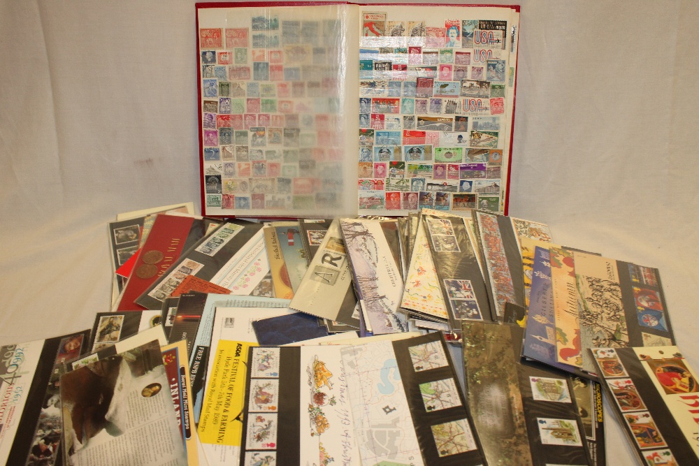 A selection of over seventy various GB stamp presentation packs ...