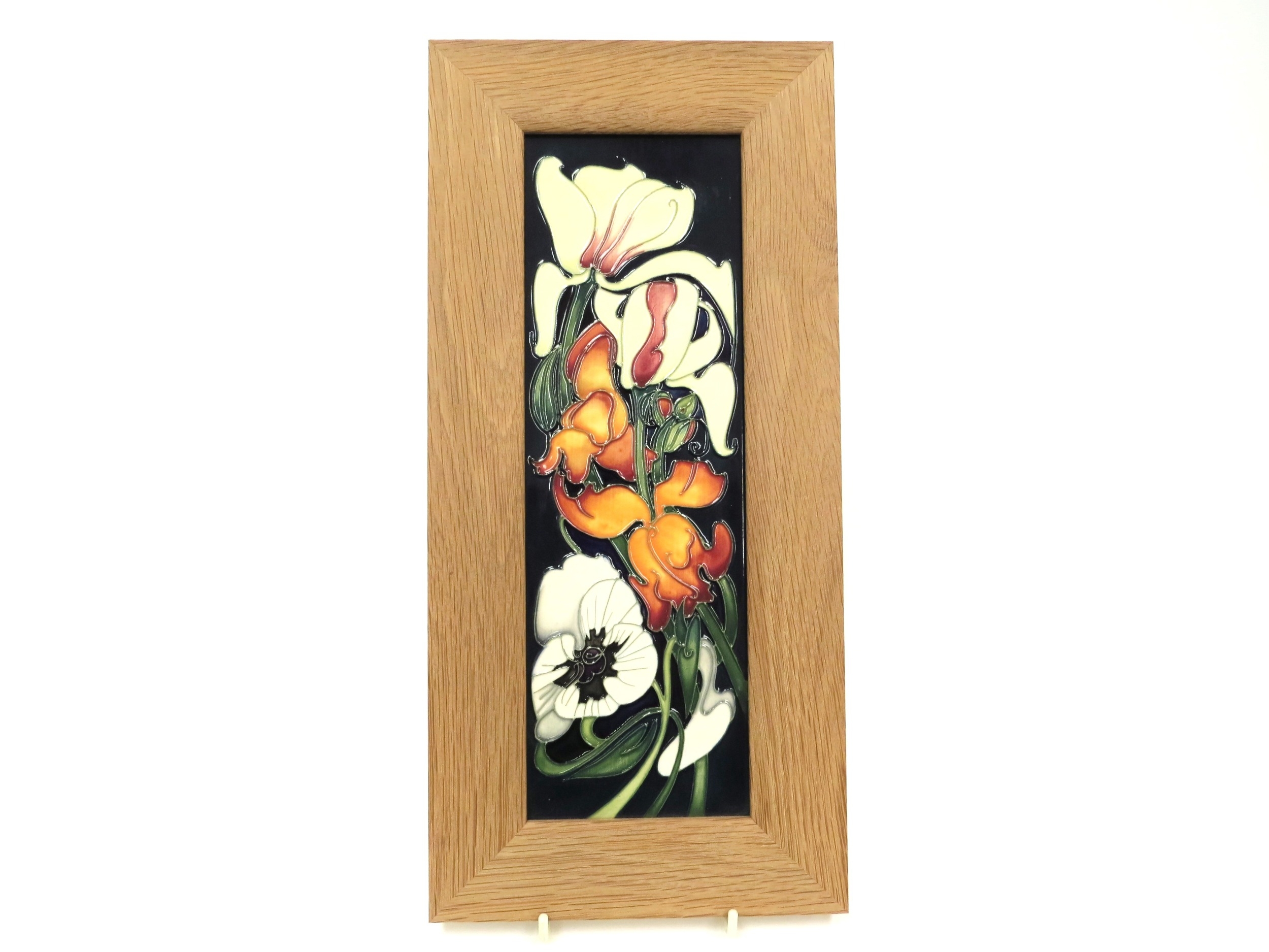 A Moorcroft Miss Alice pattern framed plaque designed by Emma Bossons ...