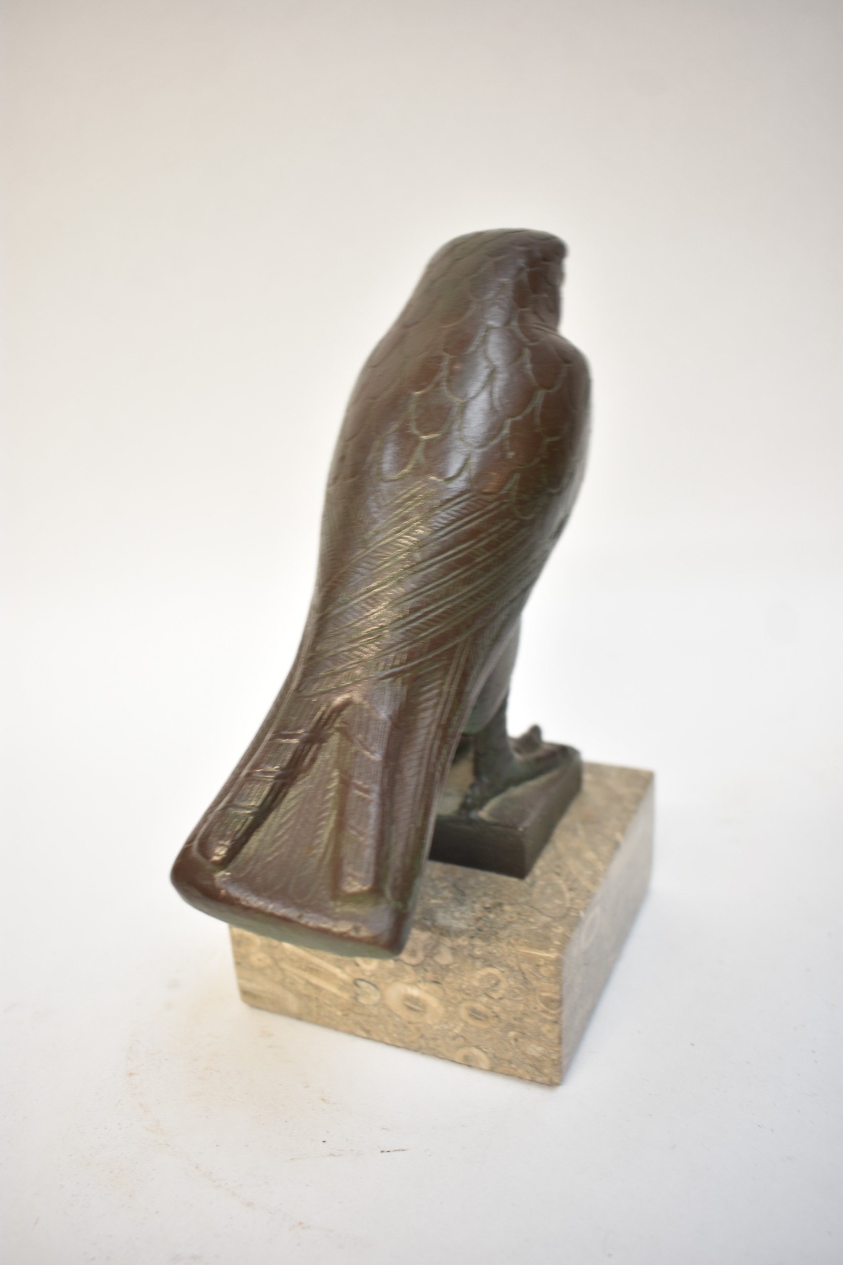 A bronze eagle figure and a bronze stork (2)