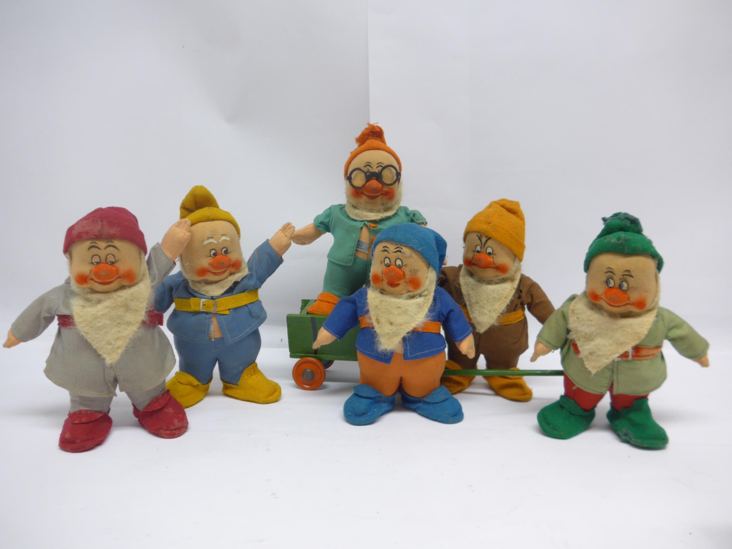 A set of six Chad Valley Hygienic Toys Walt Disney Snow White & The ...