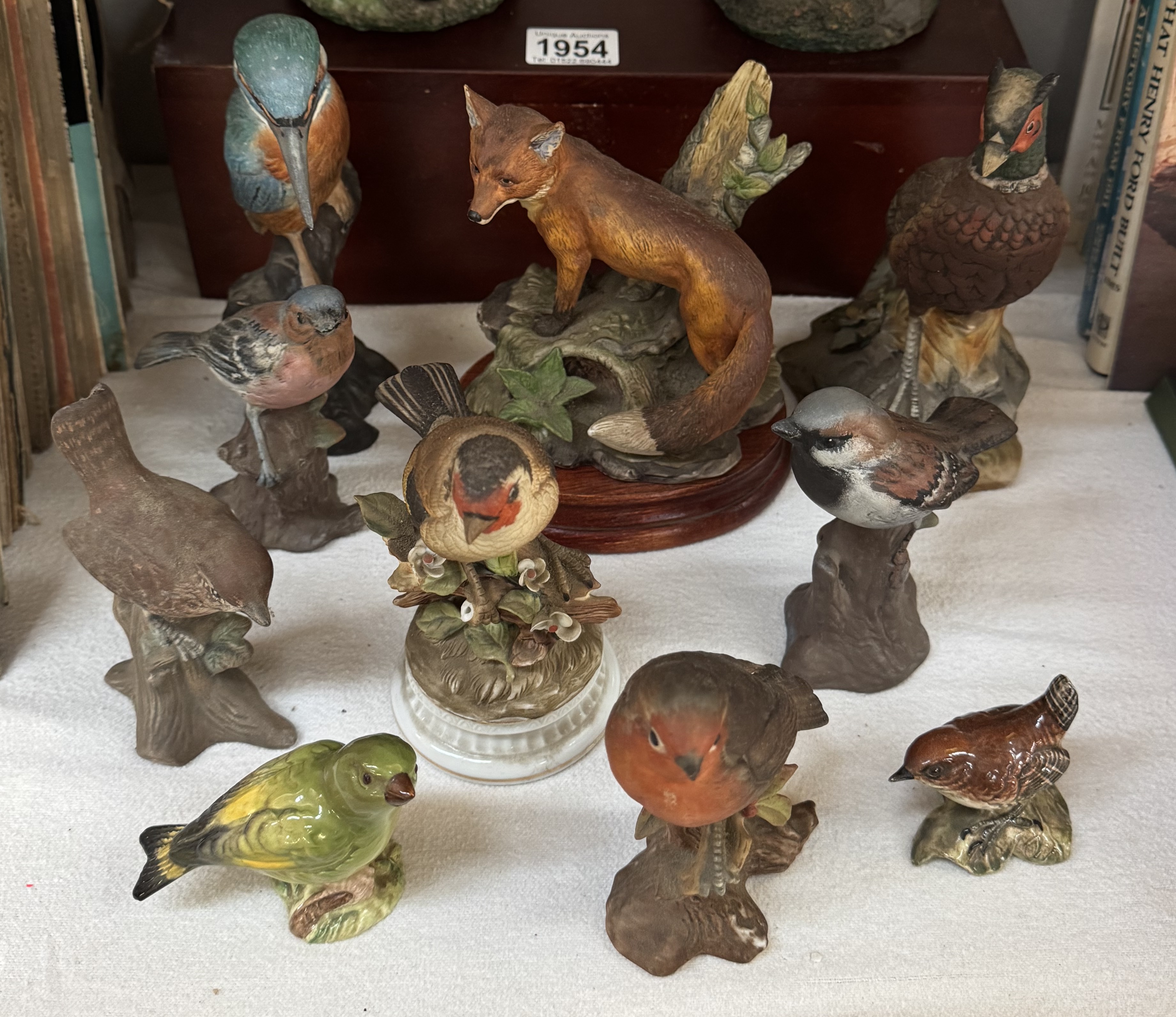 A collection of bird ornaments including Beswick & A Foo figurine