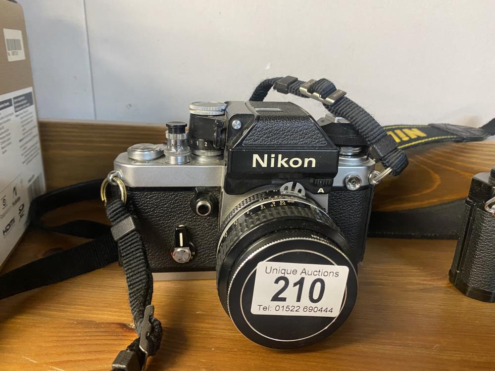A Nikon F2 camera body and Heuer lens.