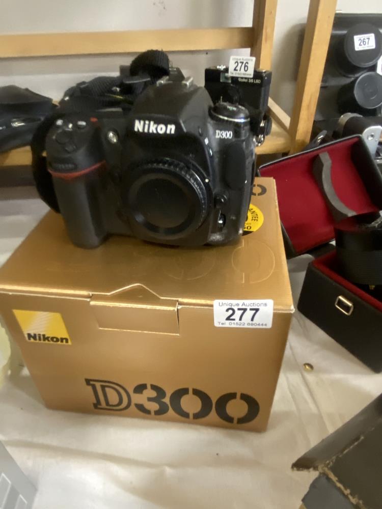 A boxed Nikon D300 camera.