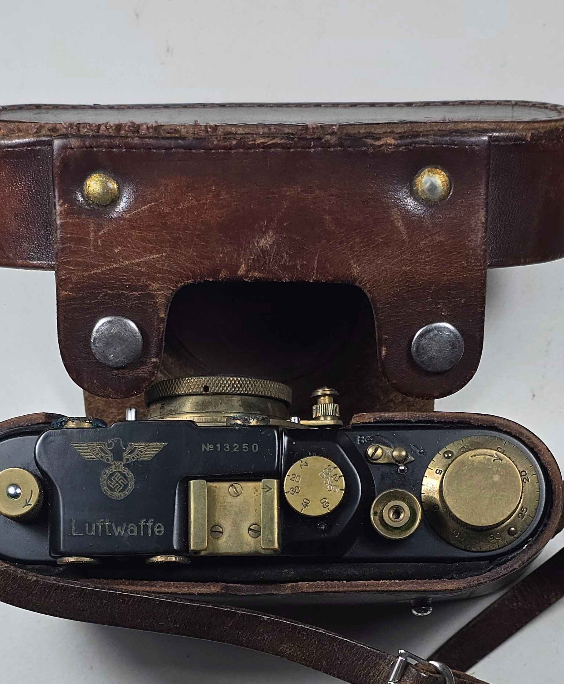 A Third Reich Luftwaffe issue camera, marked with eagle, "Lufftwaffe ...