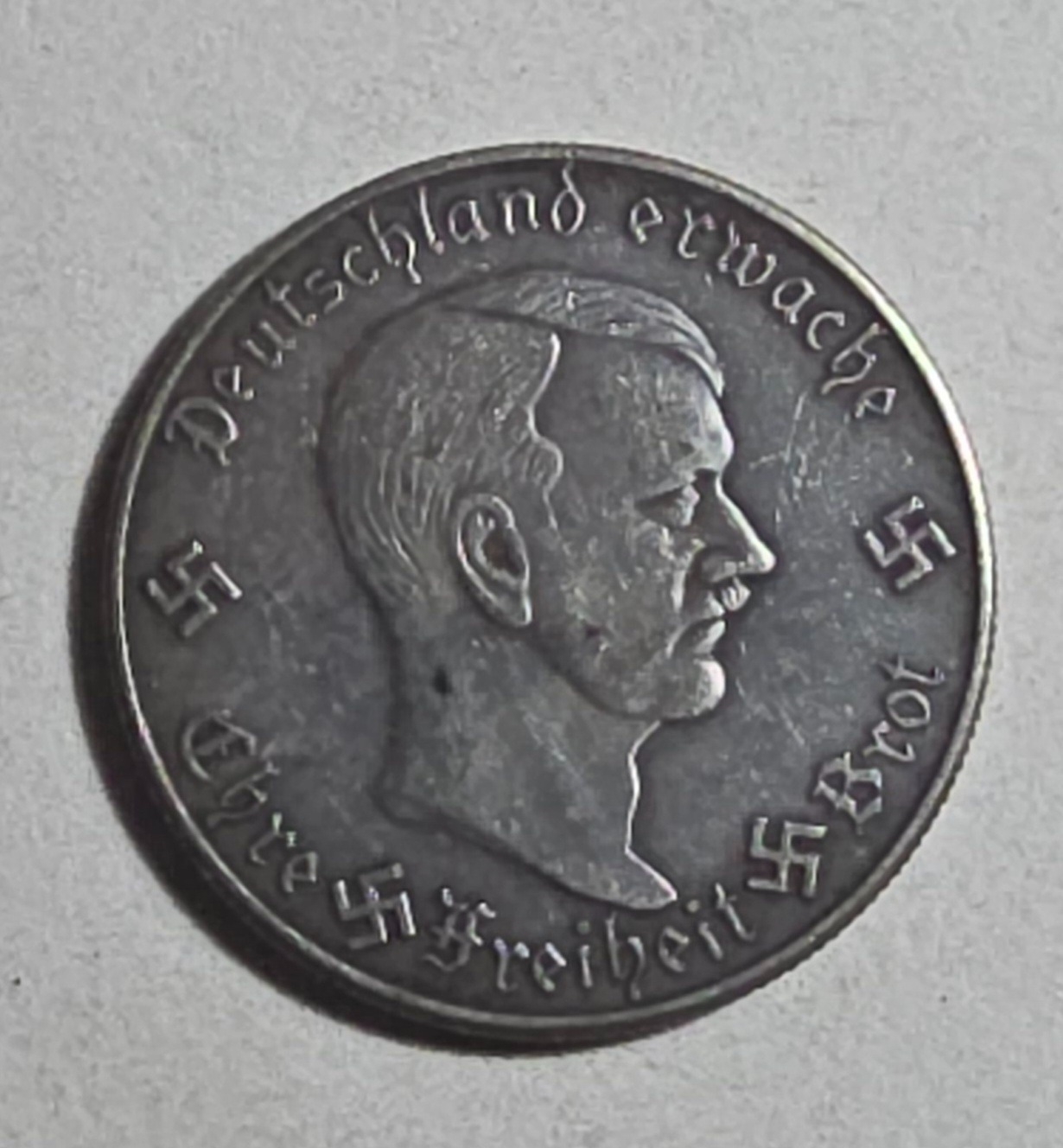 A Third Reich white metal medallion for the N.S.D.A.P. Victory in 1932 ...