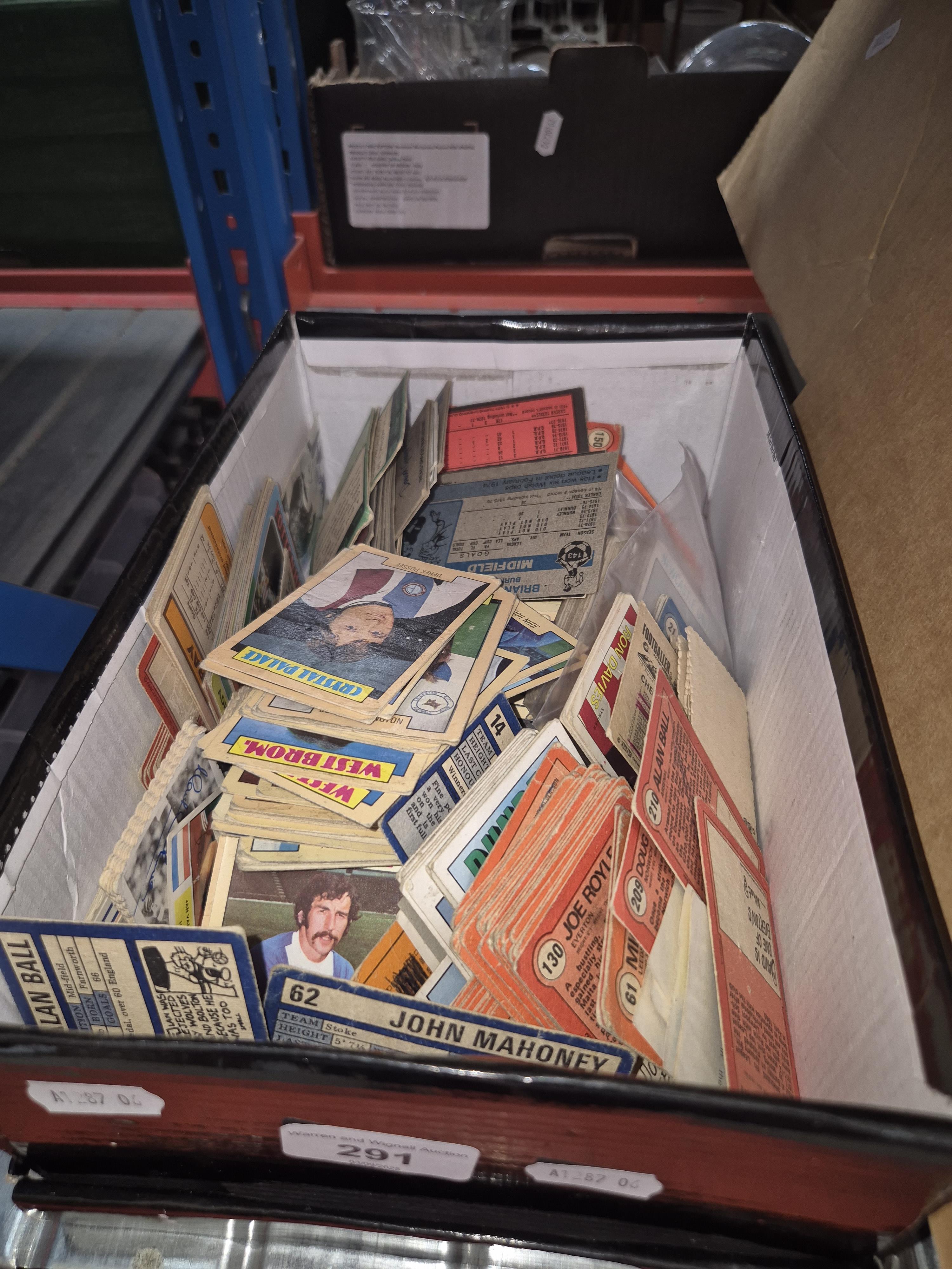 A box of football cards.