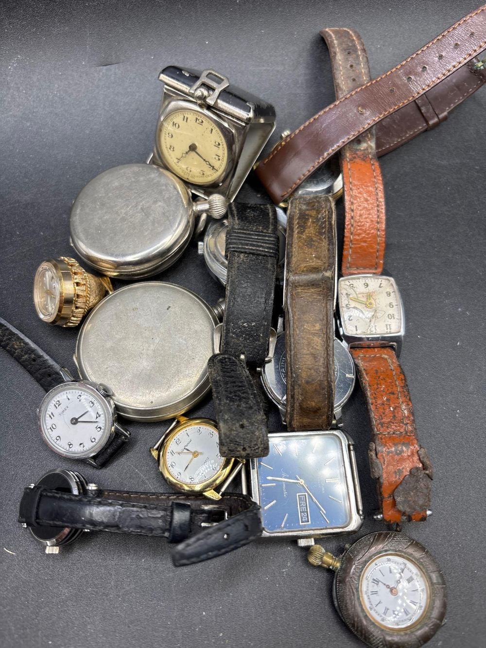 A bag of assorted wrist watches