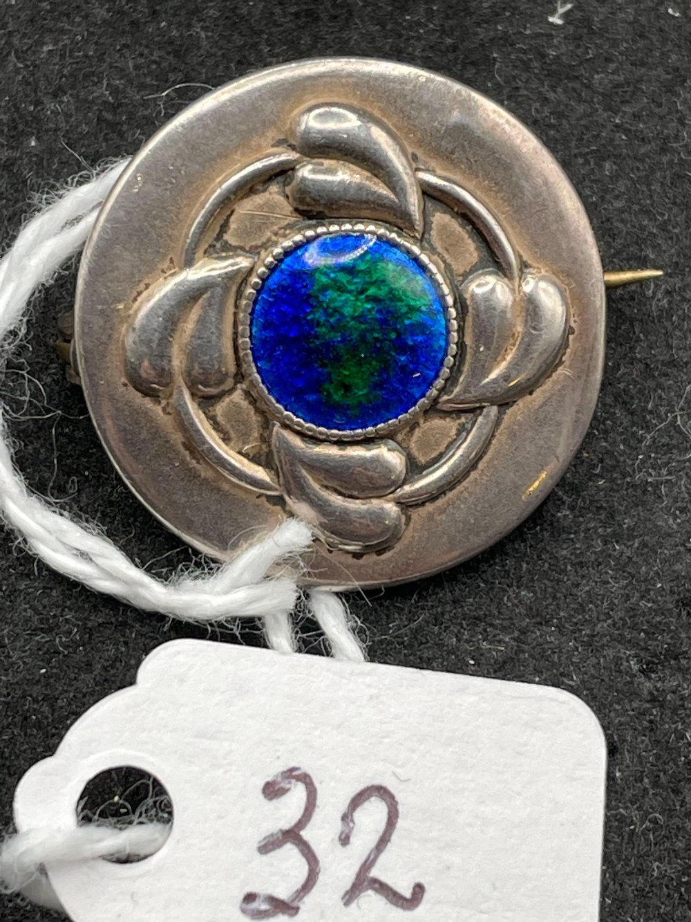 A CHARLES HORNER silver and enamel circular brooch Chester 1910