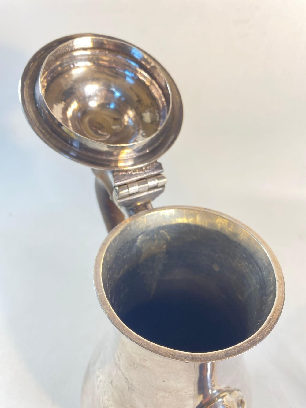 A good early George III coffee pot with crested baluster shaped body ...