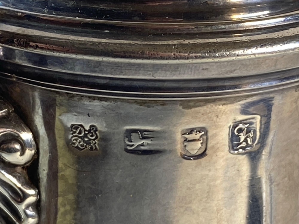 A good early George III coffee pot with crested baluster shaped body ...