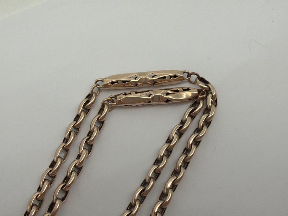 A ANTIQUE GOLD GUARD CHAIN 37 INCH 26 GMS