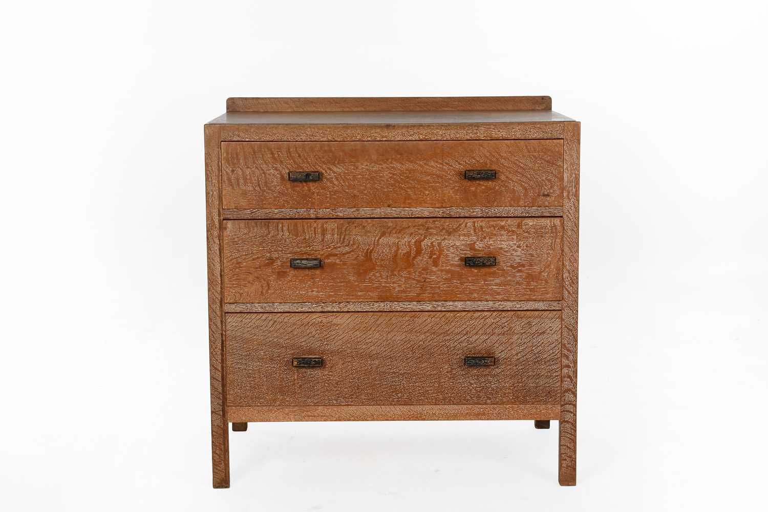 HealsAn oak chest of drawers, circa 1930with three long drawersivorine ...
