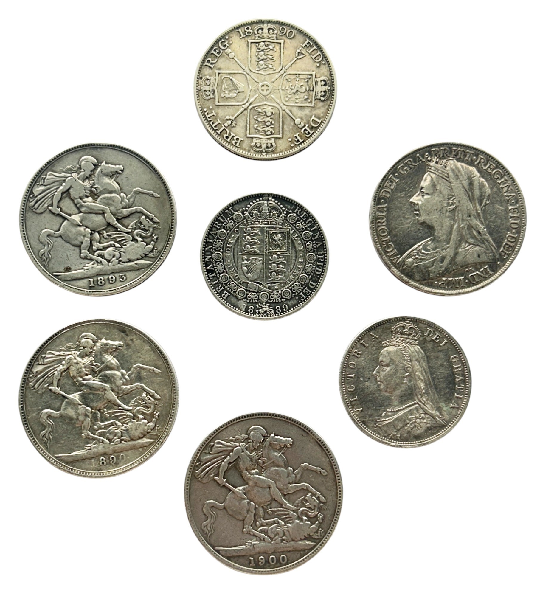 Seven Victorian silver coins to include crowns and half crowns (7)