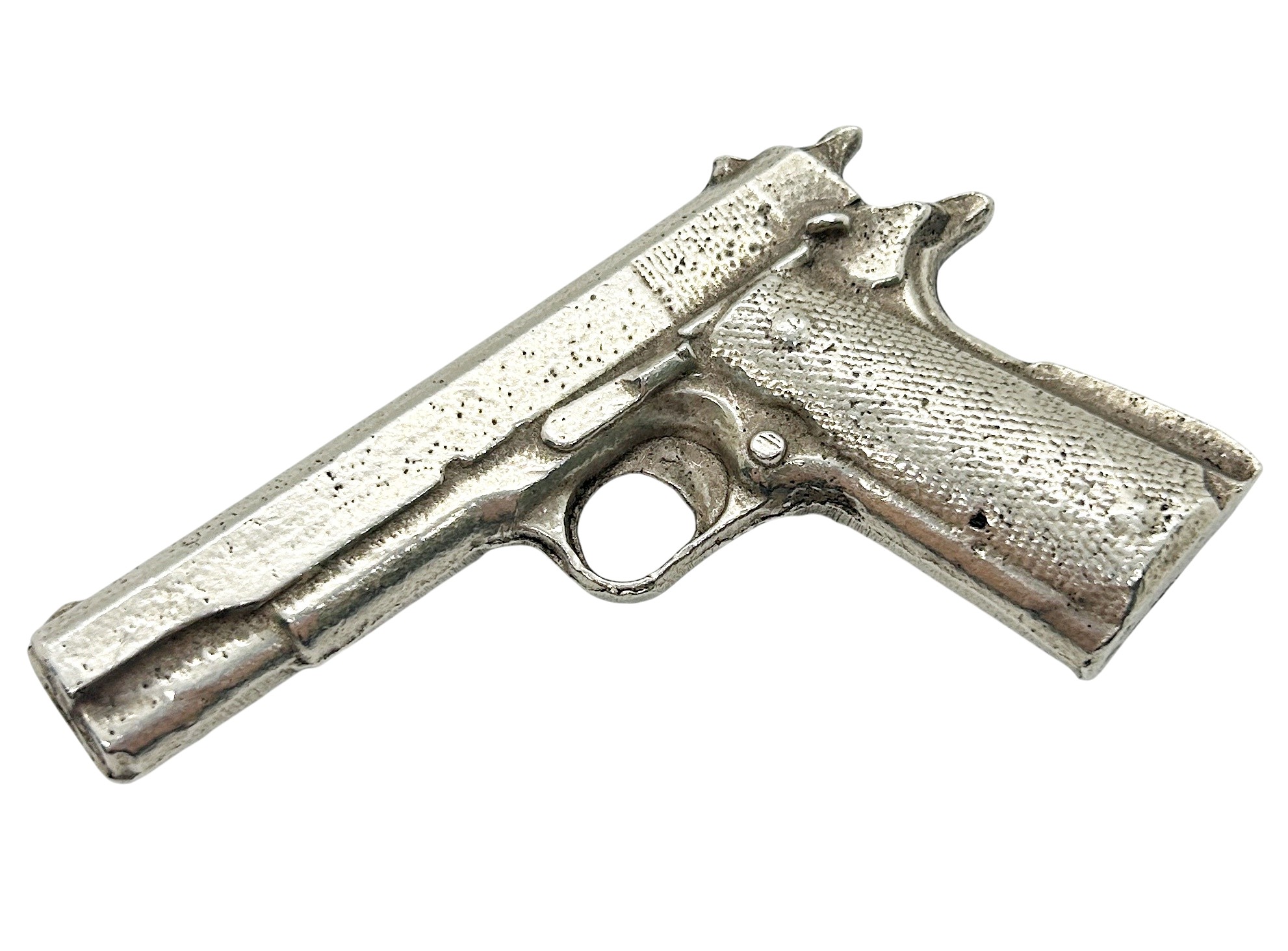 A solid silver model / paperweight in the form of a pistol gun, stamped ...