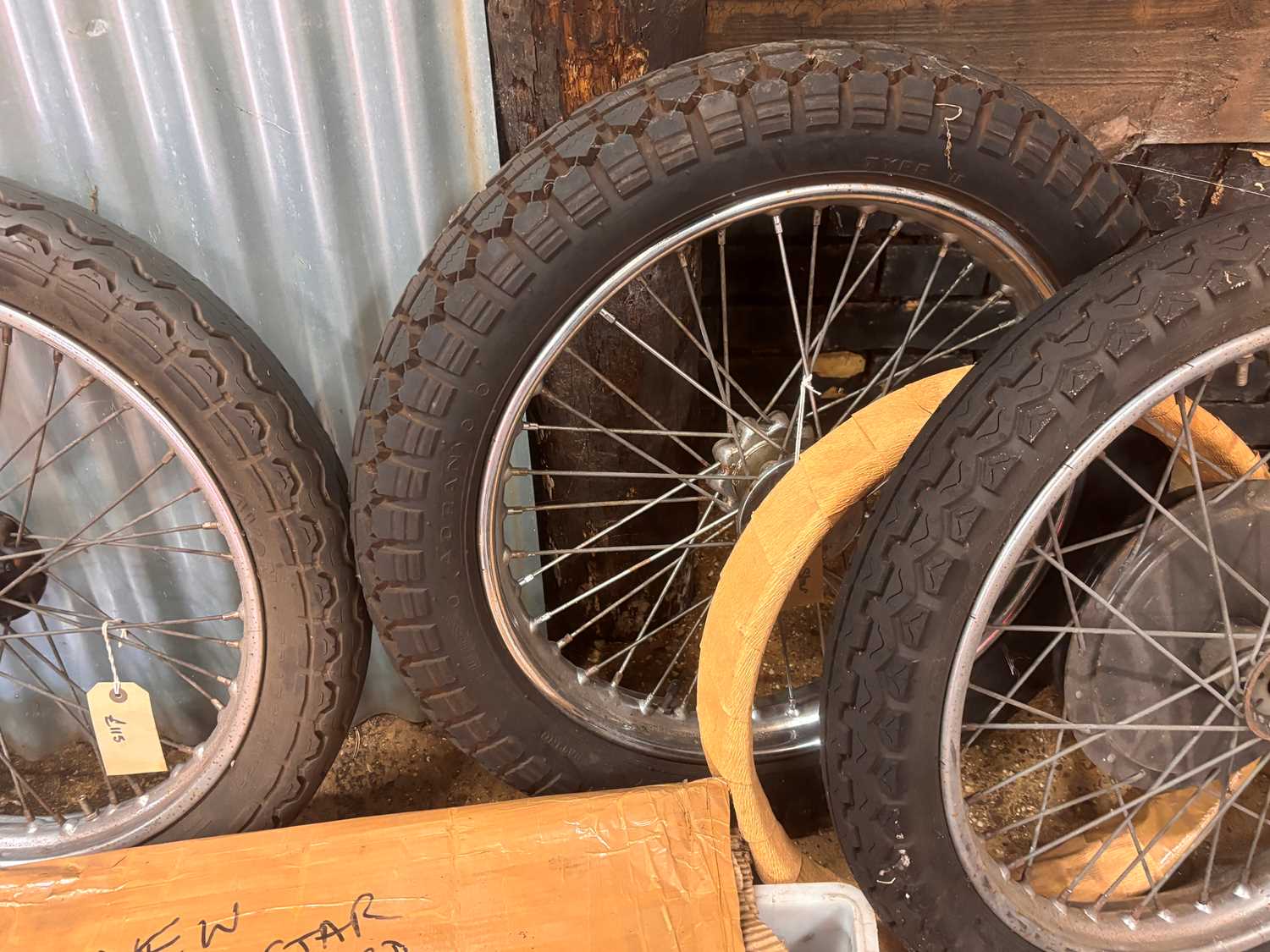 A collection of BSA motorcycle parts, comprising: a Goldstar chrome ...