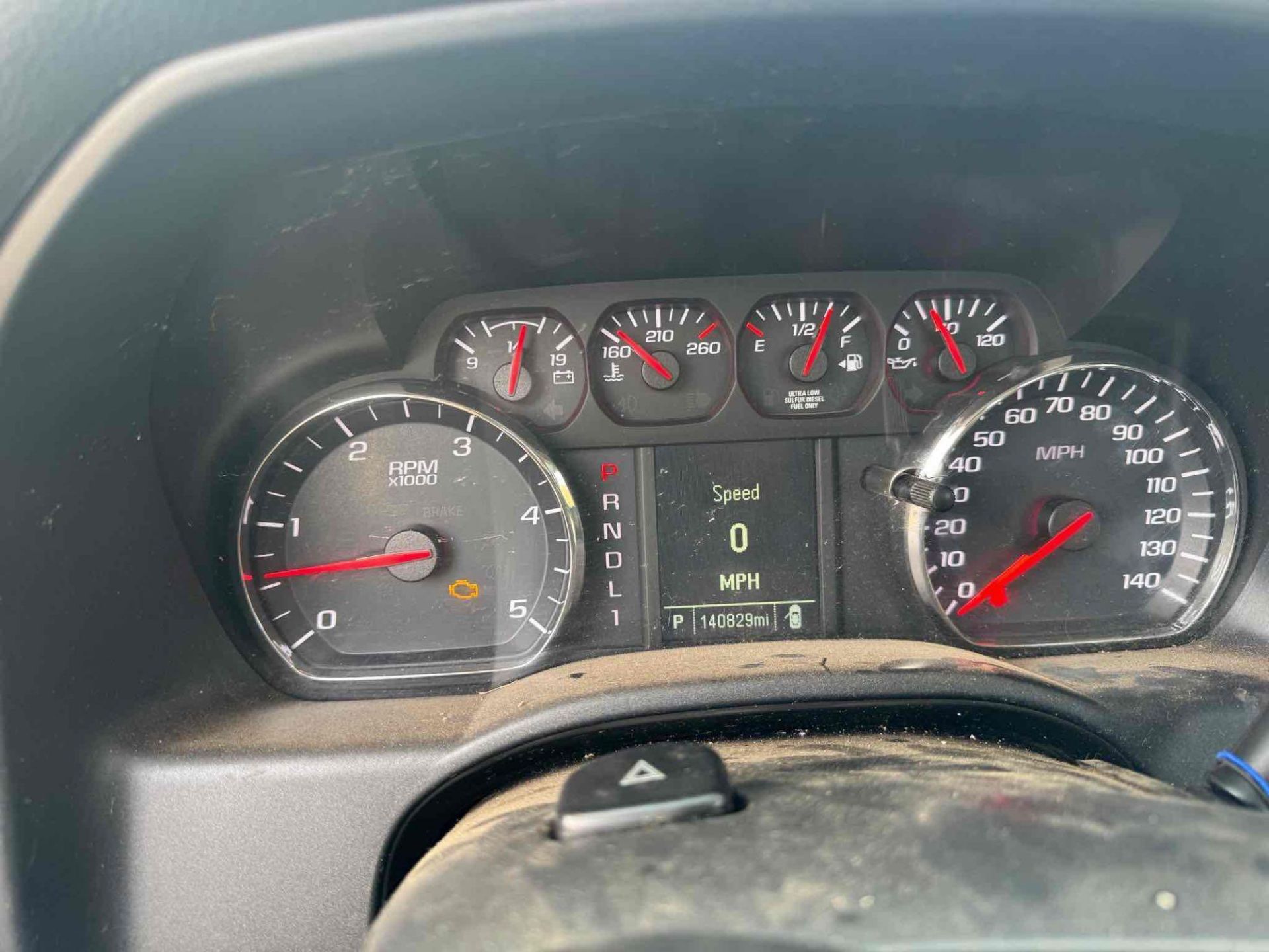 Flatbed delivery truck is a 2018 Chevrolet 3500 with 140,829 miles