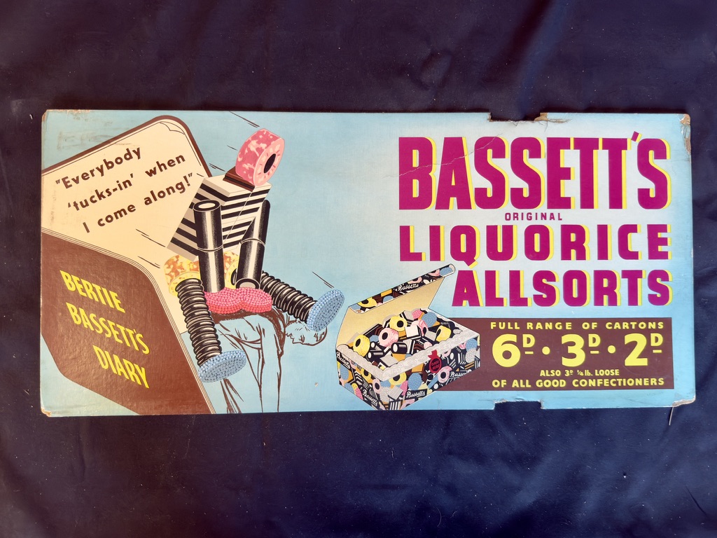 Colourful Cartoon of Bertie Bassett leap-frogging a man from within BB ...