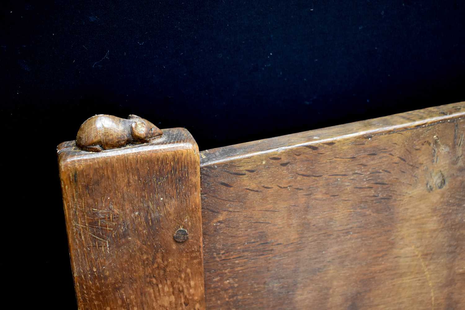 An early Robert ‘Mouseman’ Thompson single oak bed, the carved mouse ...
