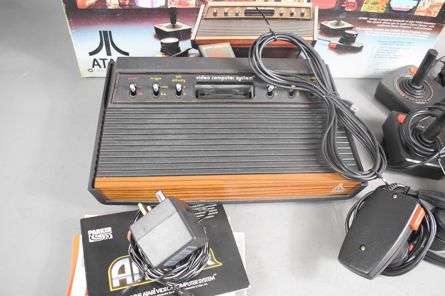 A vintage Atari CX-2600 video computer system, with two joystick ...