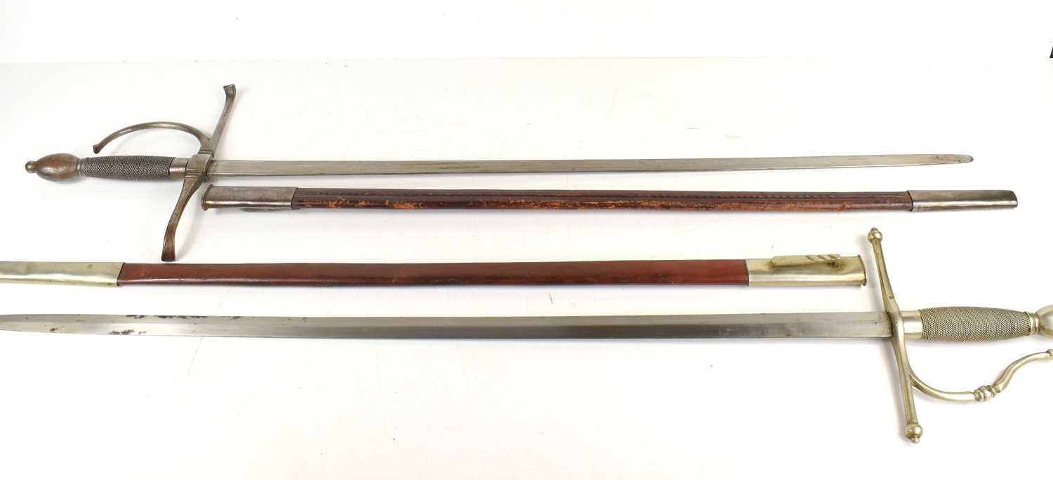Two Spanish court swords with steel wire grip handles, steel pommel and ...