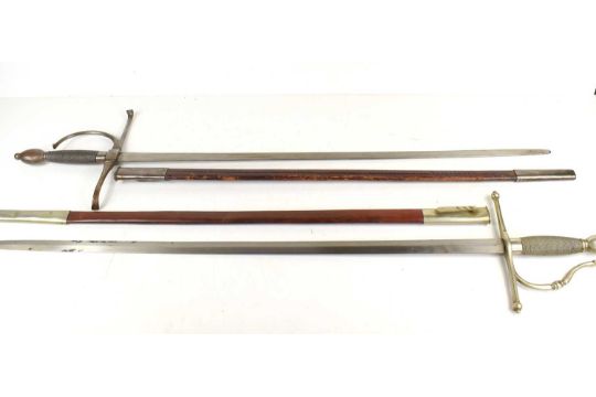 Two Spanish court swords with steel wire grip handles, steel pommel and ...