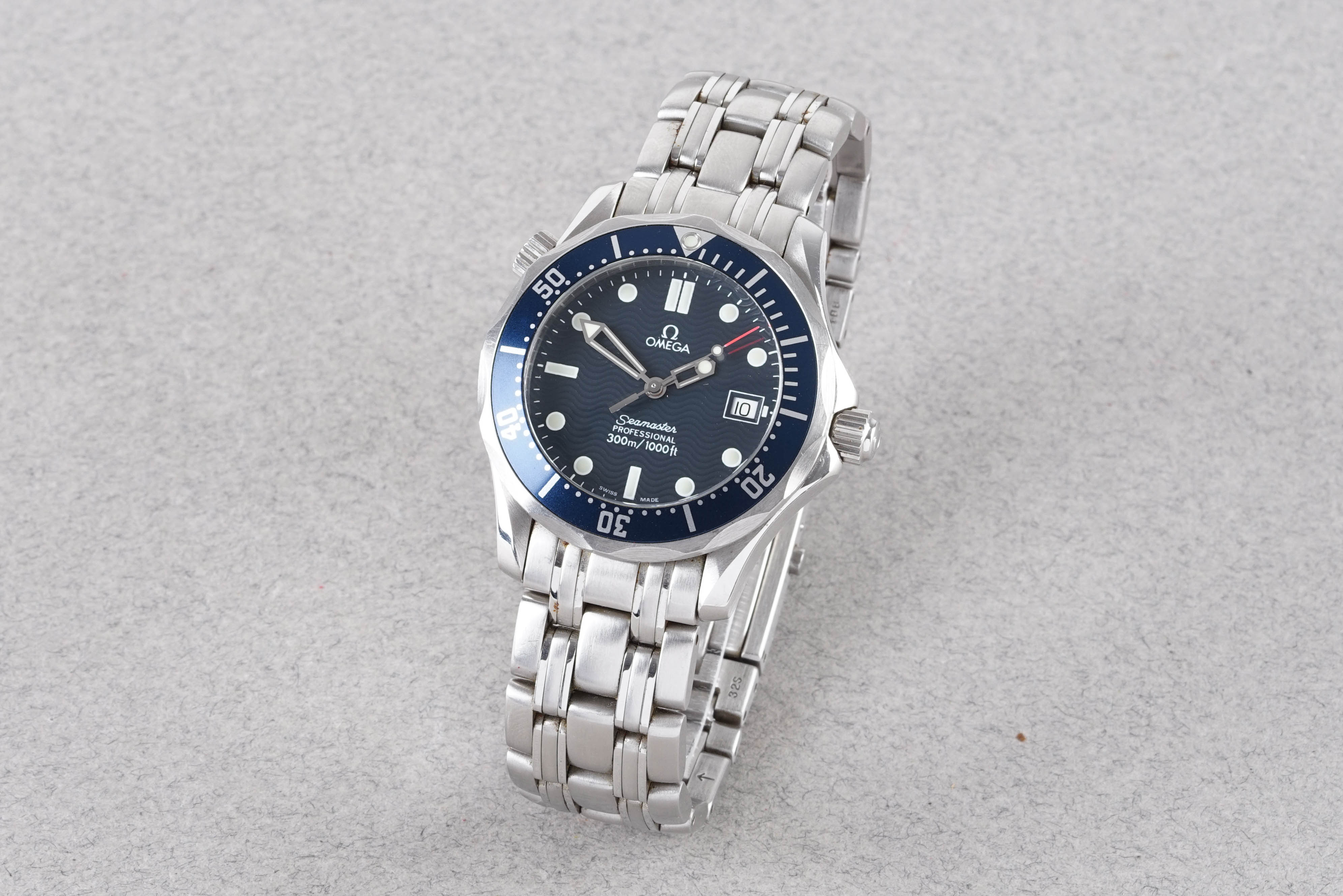 OMEGA SEAMASTER 300 DATE W/ GUARANTEE CARD, this watch is fitted with a ...