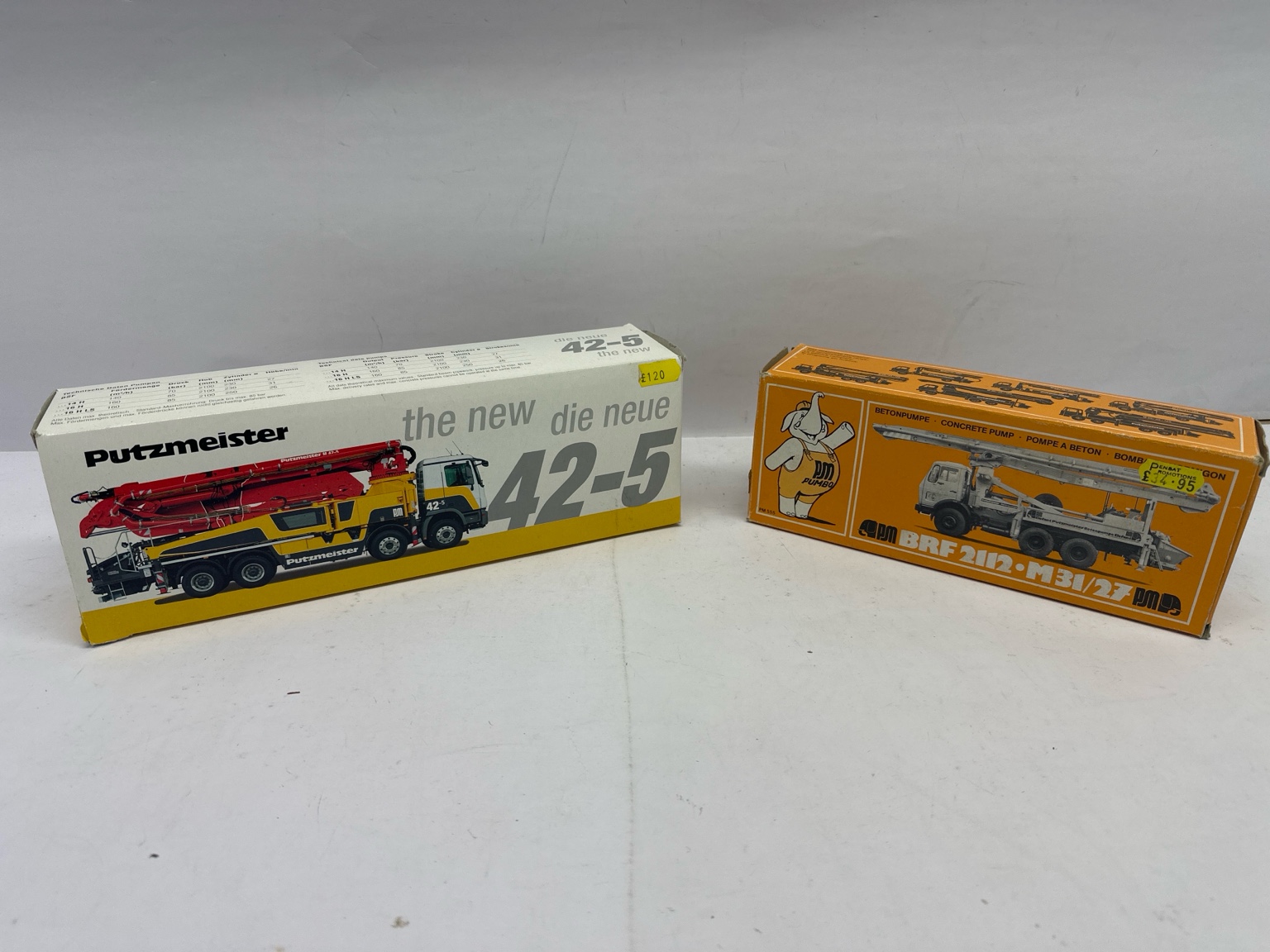 A pair of Conrad 1:50 scale models including a Putzmeister 42-5 truck ...