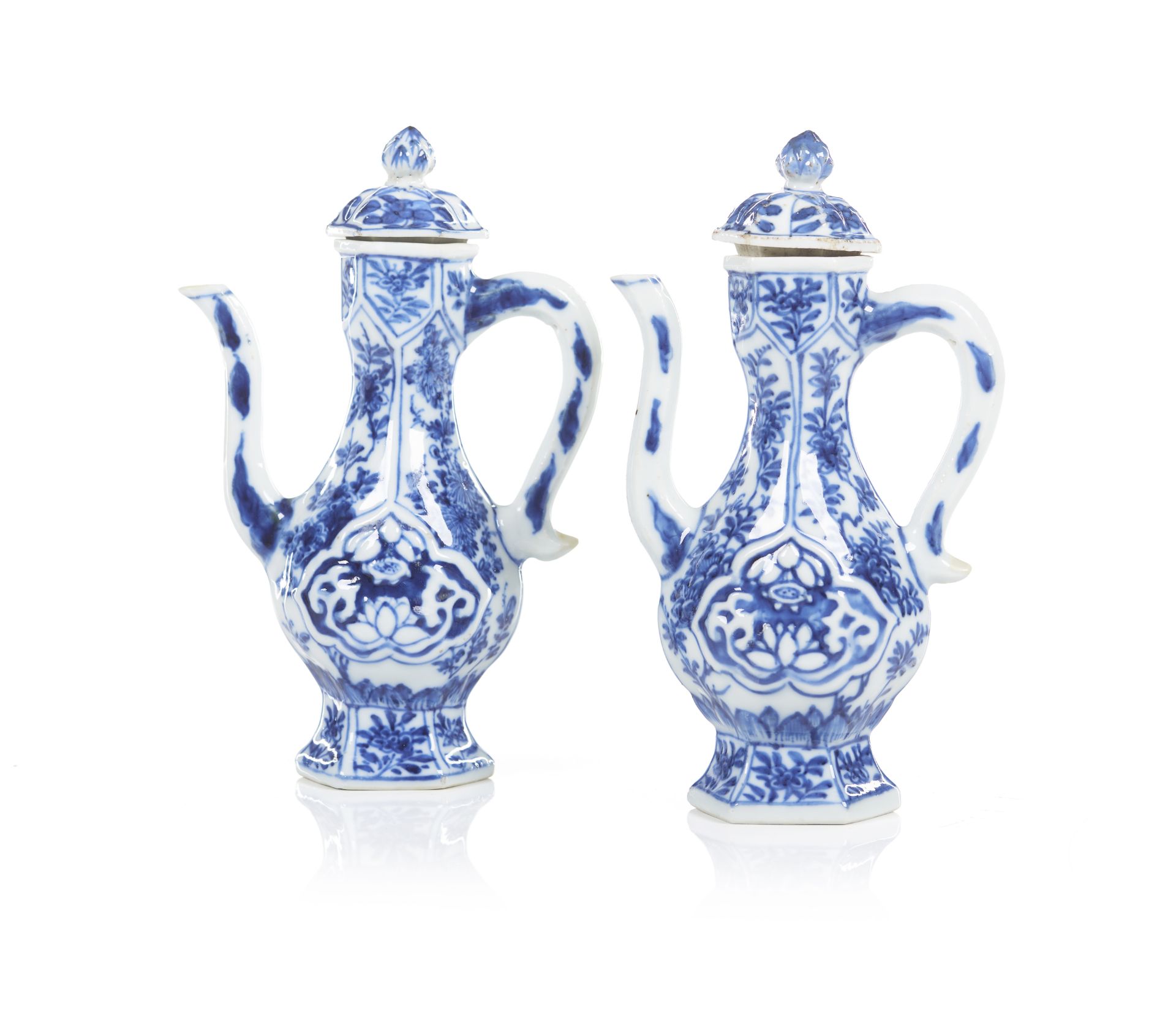 A pair of Chinese export porcelain cruets with covers With faceted ...