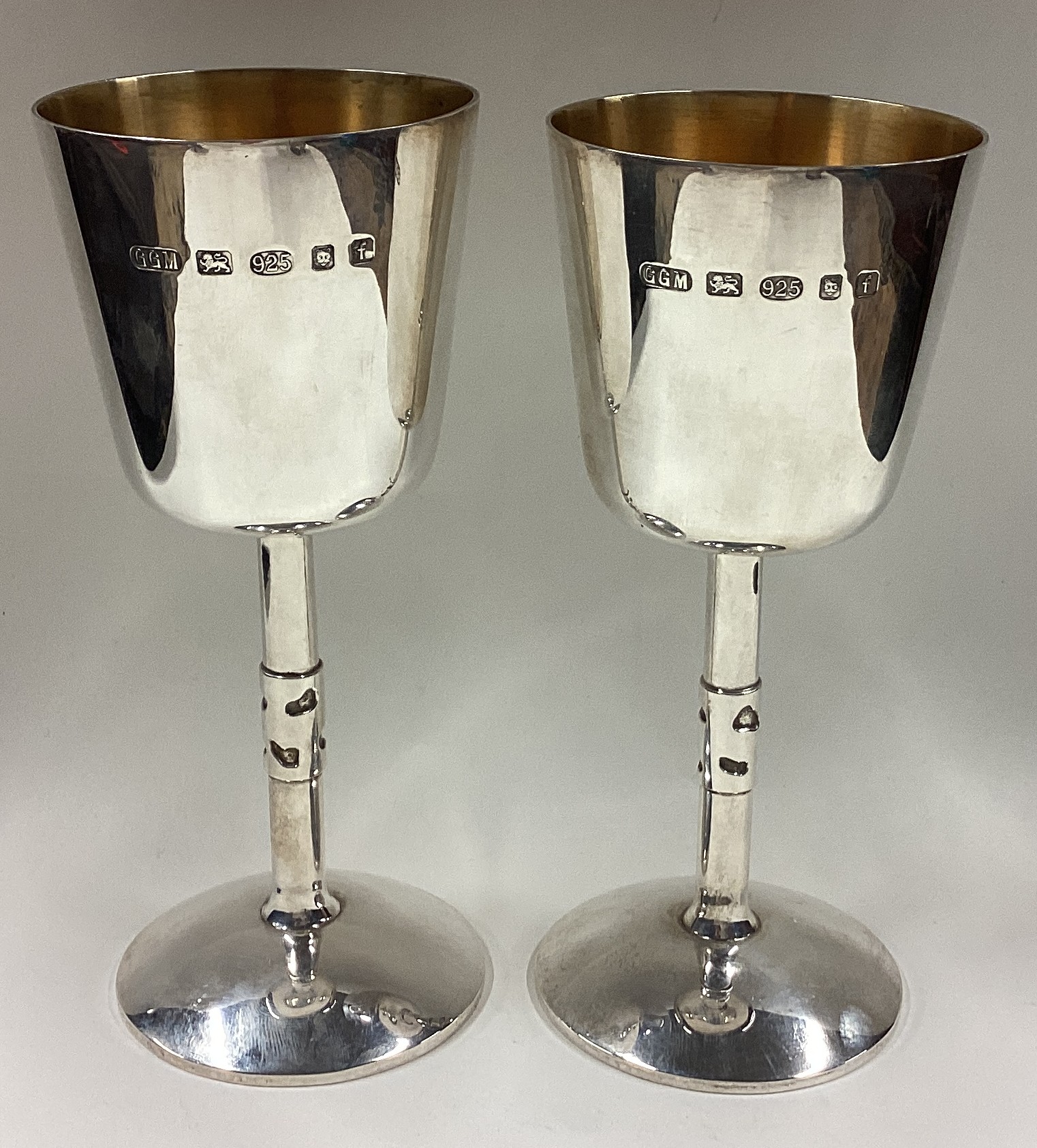 A pair of silver goblets with textured stems. London 2005. By George ...
