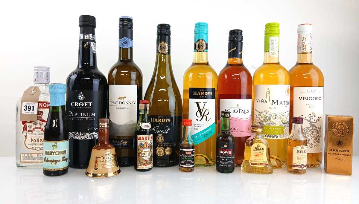 8 bottles and 7 miniatures, 1x Smirnoff Vodka 65.5proof 13 1/3 fl oz 37 ...