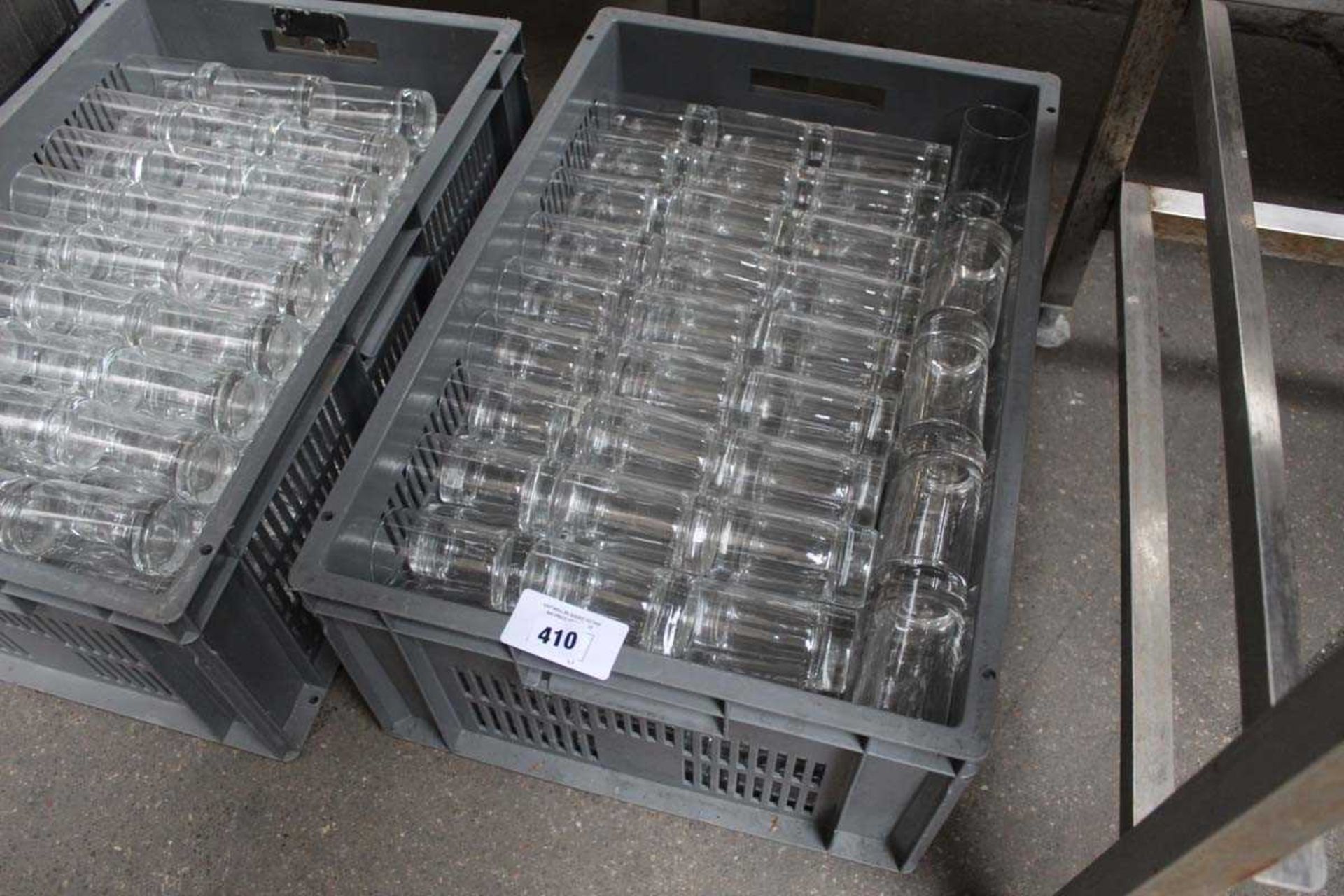 +VAT Large plastic stacking crate containing a large number of small ...