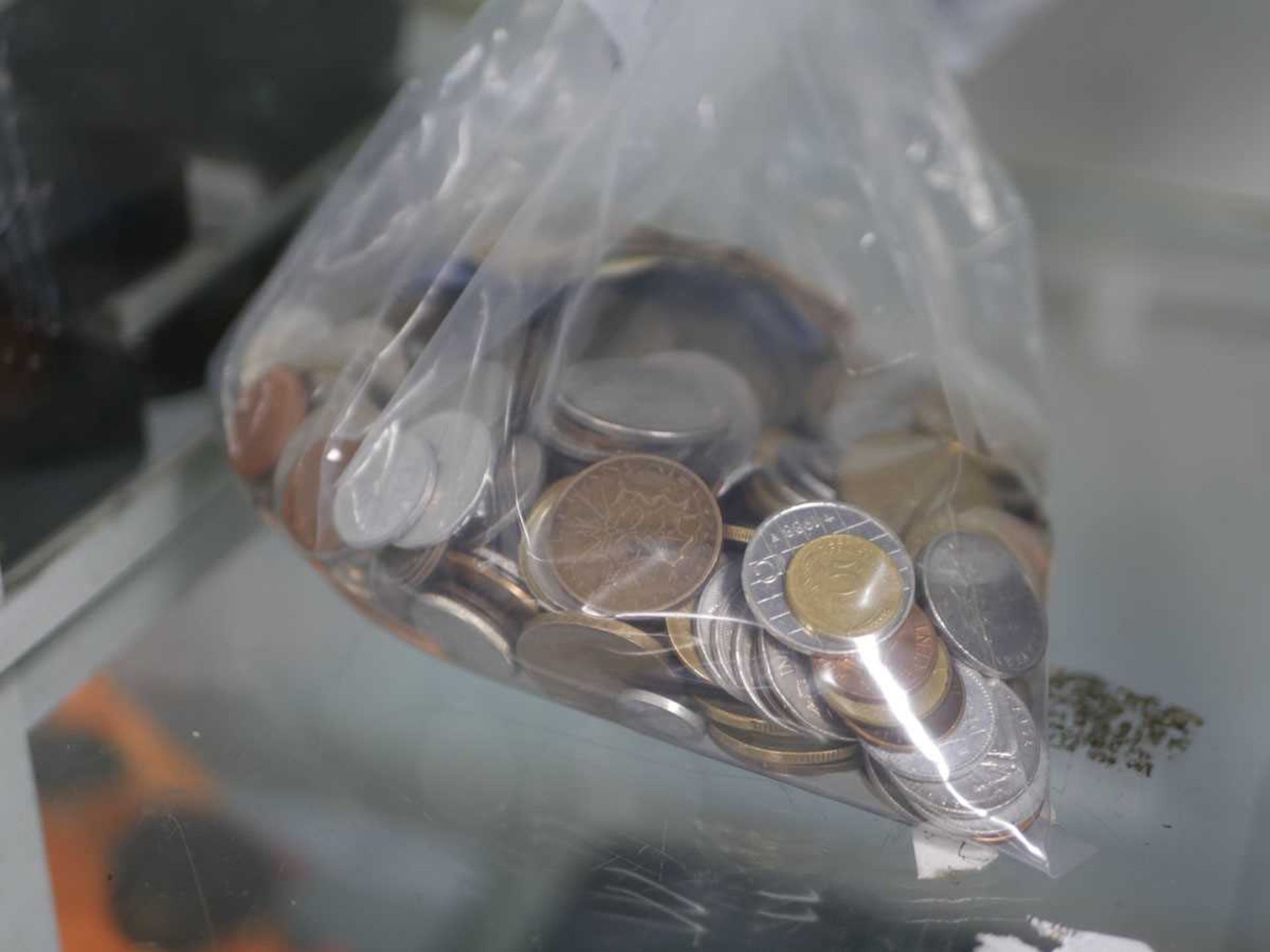 +VAT Bag containing various coins and notes