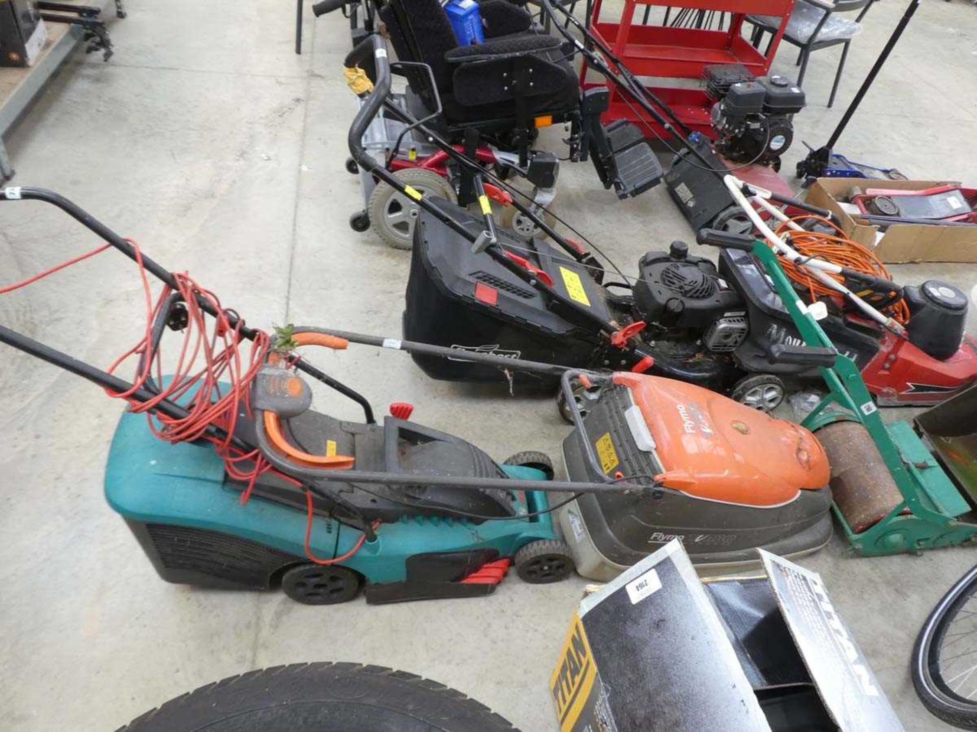 Bosch electric garden mower together with a Flymo Turbo electric garden ...