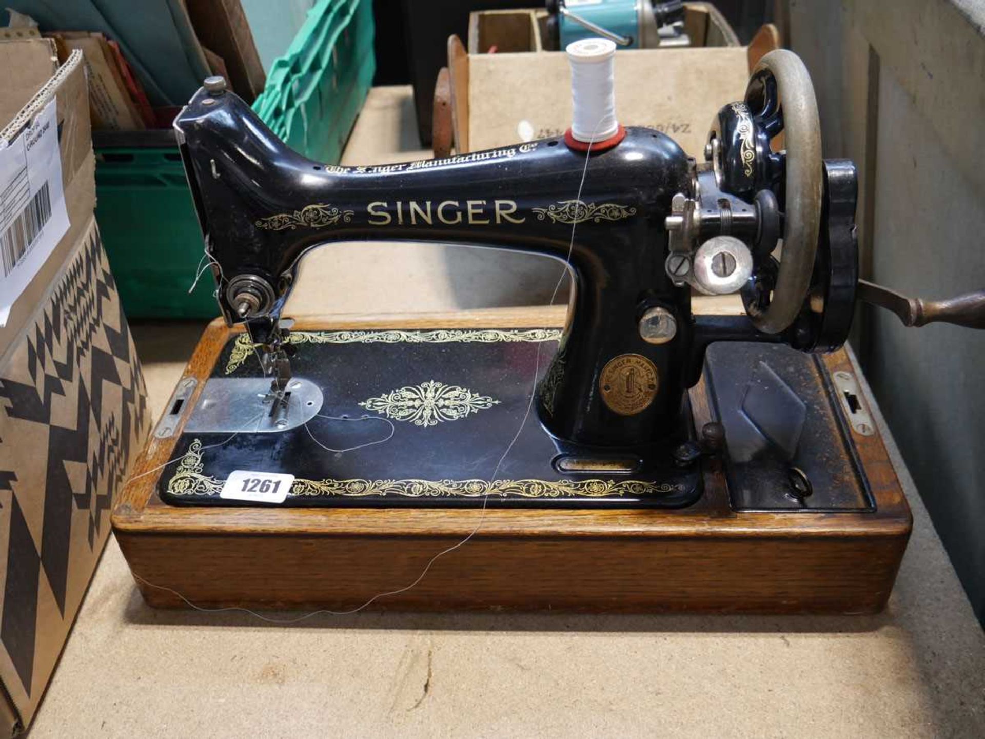 Wooden cased Singer sewing machine