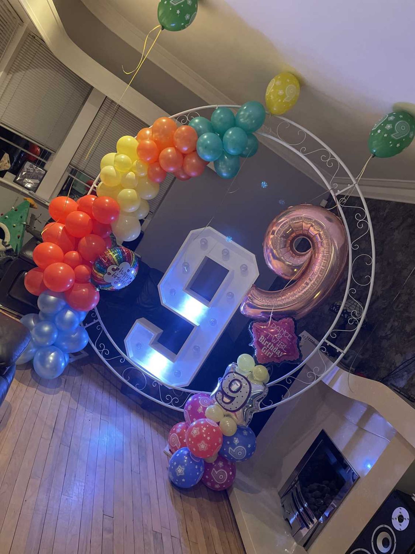 Large circular metal balloon frame