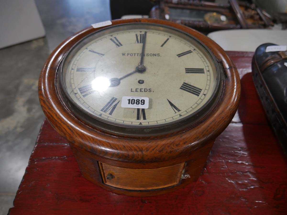 Mahogany cased circular wall clock, the dial bearing the maker's name ...