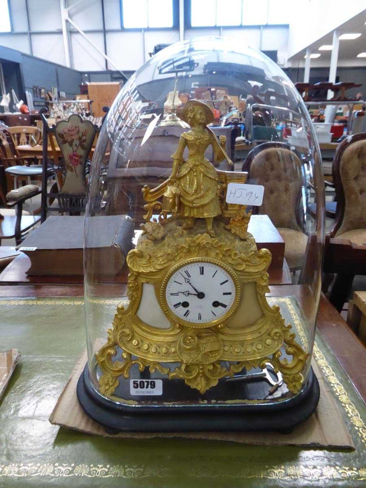 French mantel clock with glass dome
