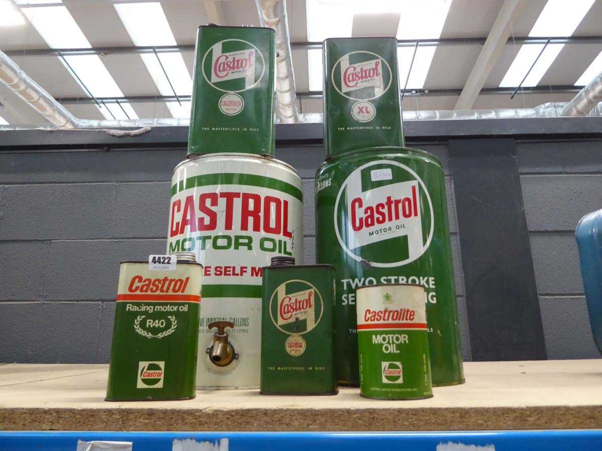 7 assorted vintage Castrol oil cans